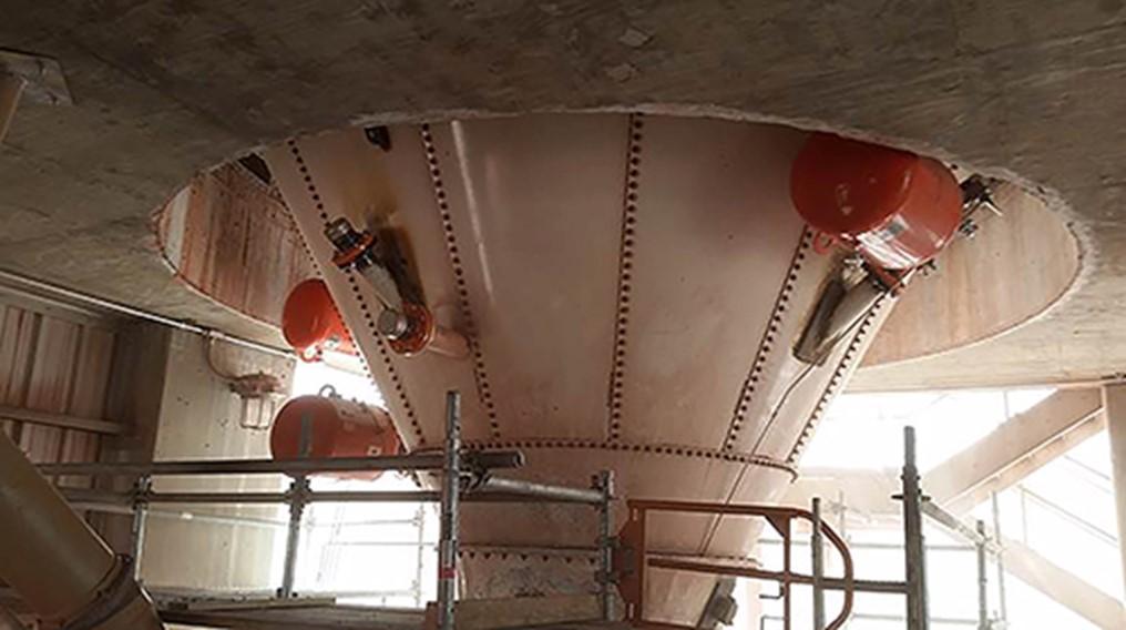 Storage Sorrow: Loosening Silo & Hopper Clogs in Cement Plants | Hub-4